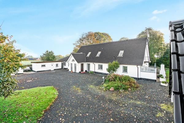 RealMæglerne Tøt Jensen - Lokal ejendomsmægler Brørup